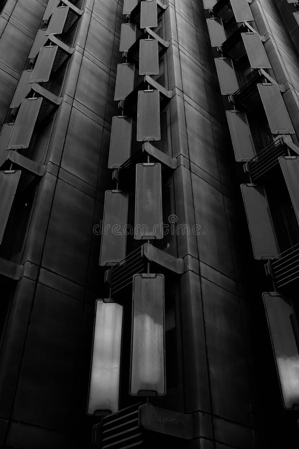 Vertical Grey Scale Shot of the Facade of a Building Stock Image ...