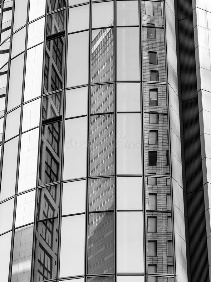 Vertical Greyscale Facade of a Modern Office Building with Glass ...