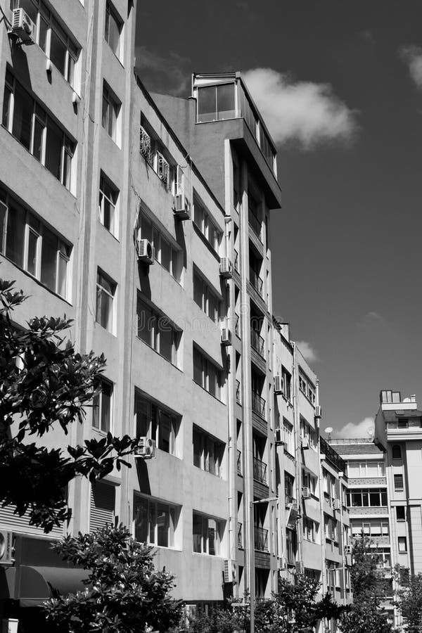 Vertical Greyscale Shot of an Old Residential Building Stock Photo ...