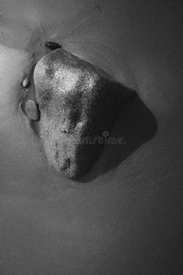 Vertical Greyscale Shot a Rock at the Beach Stock Photo - Image of ...