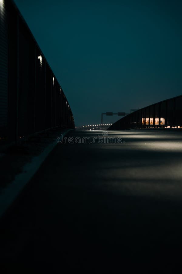 Vertical Ground Level Shot of a Bridge at Night Stock Photo - Image of ...