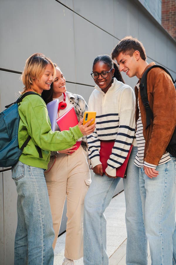 Vertical Group of Teenage Students Talking on the University Campus ...