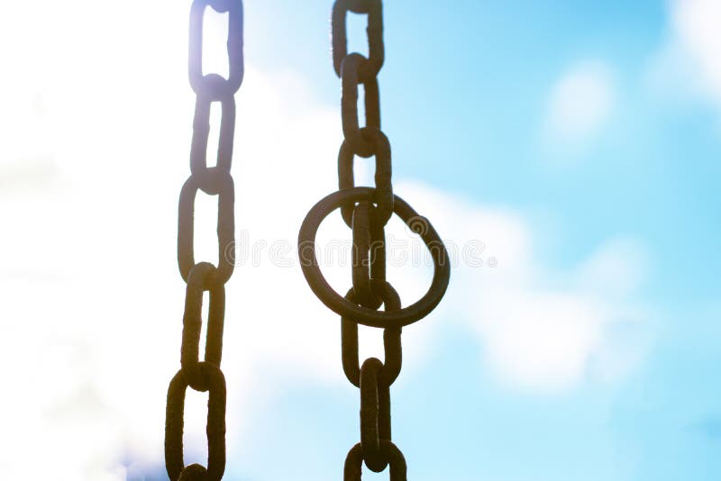 Vertical Hanging Rusty Chain. Sunlight, Blue Background Stock Photo ...