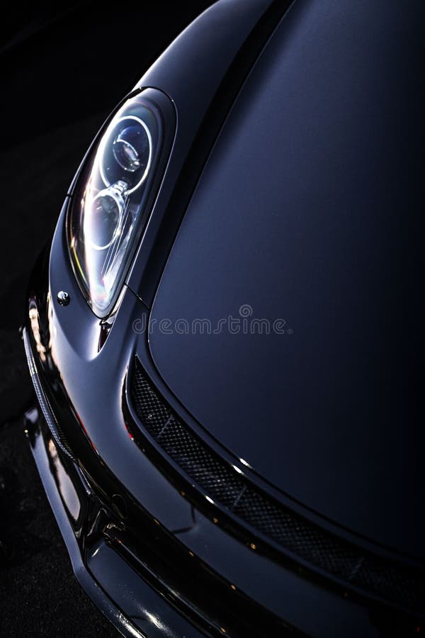 Vertical High-angle Closeup of a Black Car S Headlight. Stock Photo ...