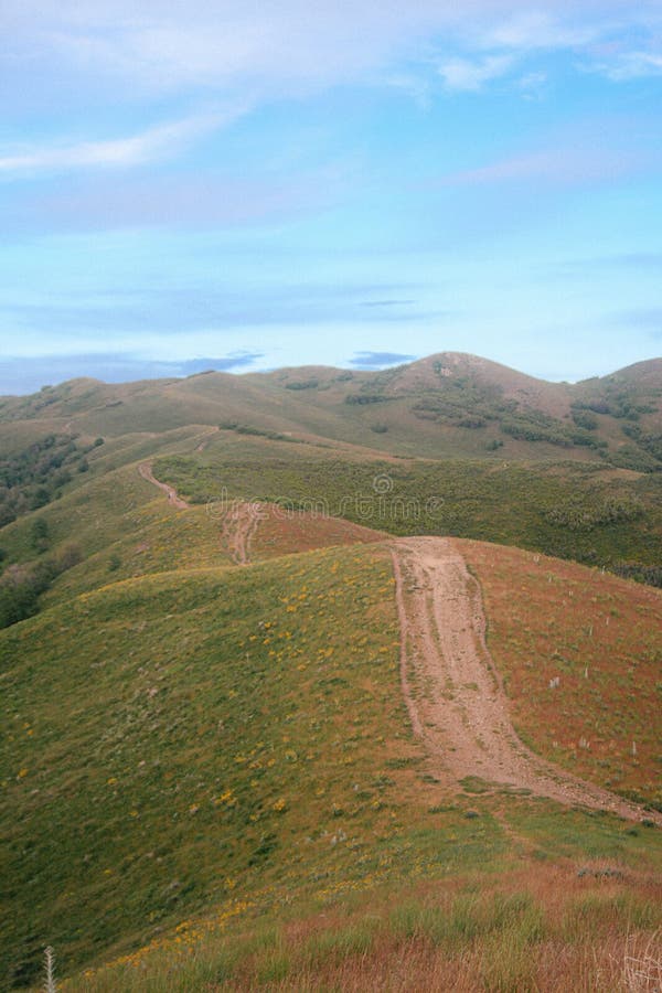Vertical High-angle of a Dusty Path on the Green Mountains with a ...