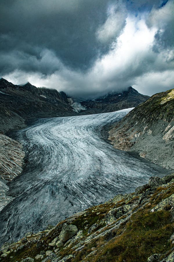Vertical High-angle of a River Flowing through Mountains Long Exposure ...
