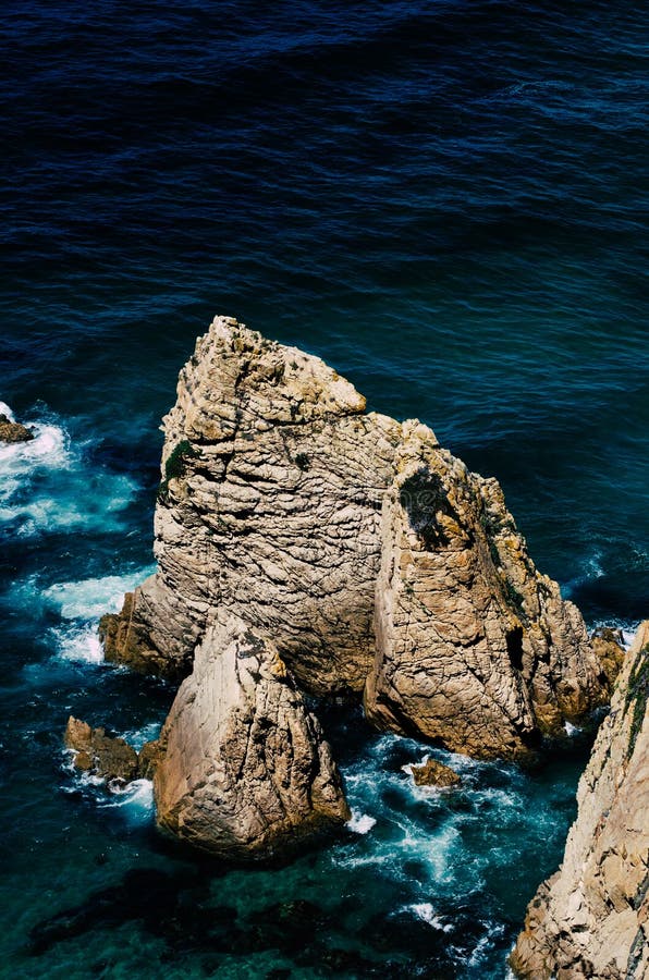 Vertical High Angle Shot of Big Rock Formations in the Sea Stock Image ...