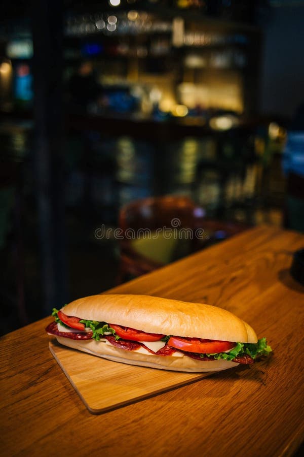 Vertical High Angle Shot of a Delicious-looking Sandwich in a Cafe ...