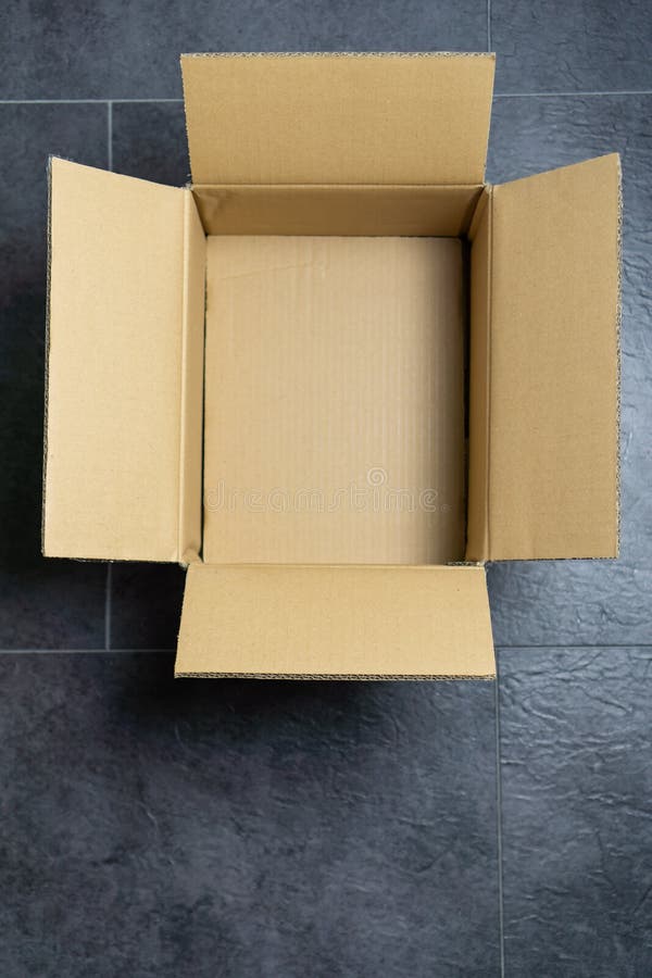Vertical High Angle Shot of an Opened Cardboard Box Stock Image - Image ...