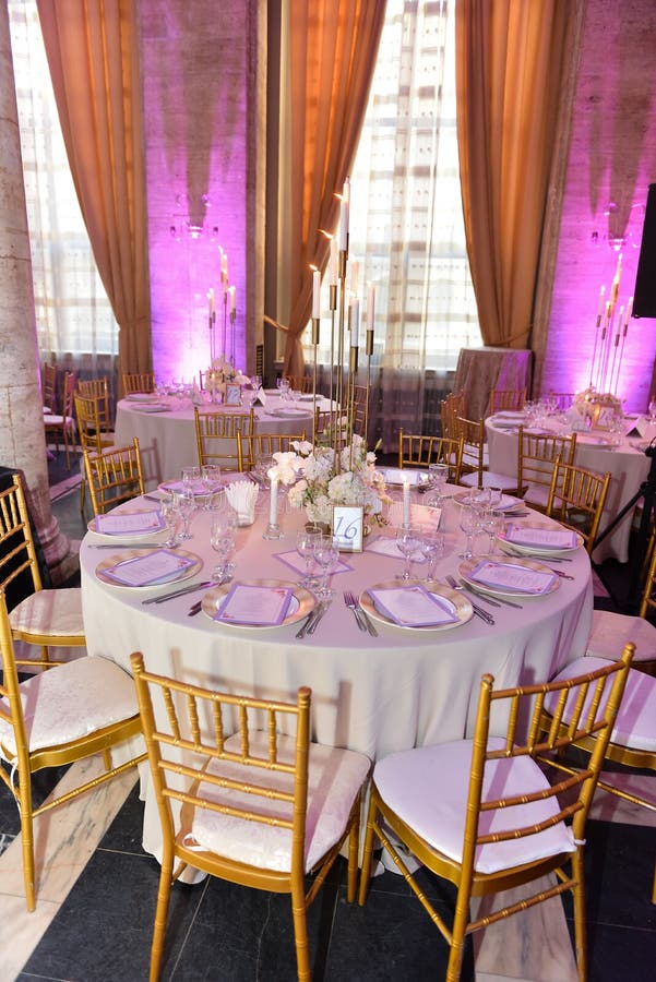 Vertical High Angle Shot of a Round Table with an Elegant Setting in ...