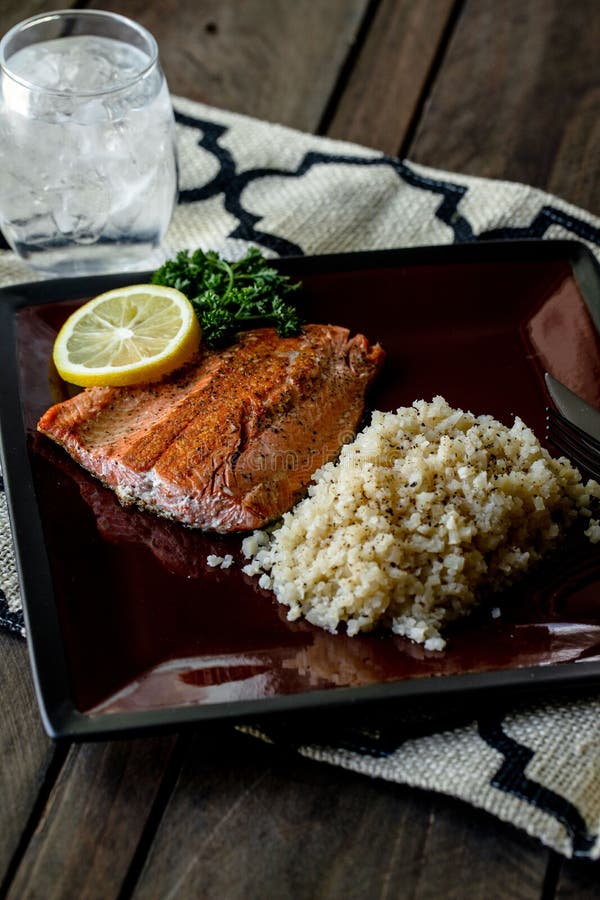 Vertical High Angle Shot of a Salmon and Rice Meal Stock Photo - Image ...