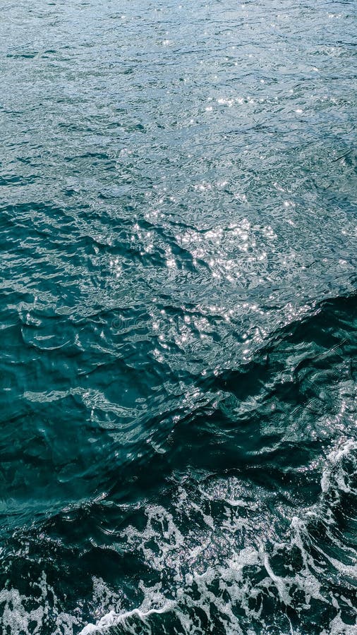 Vertical High Angle Shot of the Turquoise Water of the Ocean Stock ...