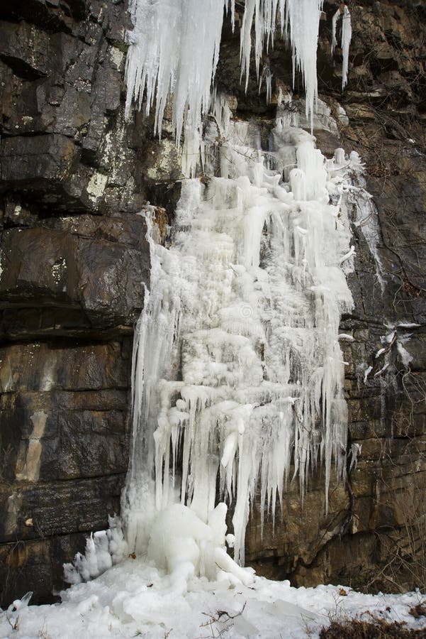 Vertical-Icicles Patterns Falling from a Cliff in Ice. Stock Photo ...