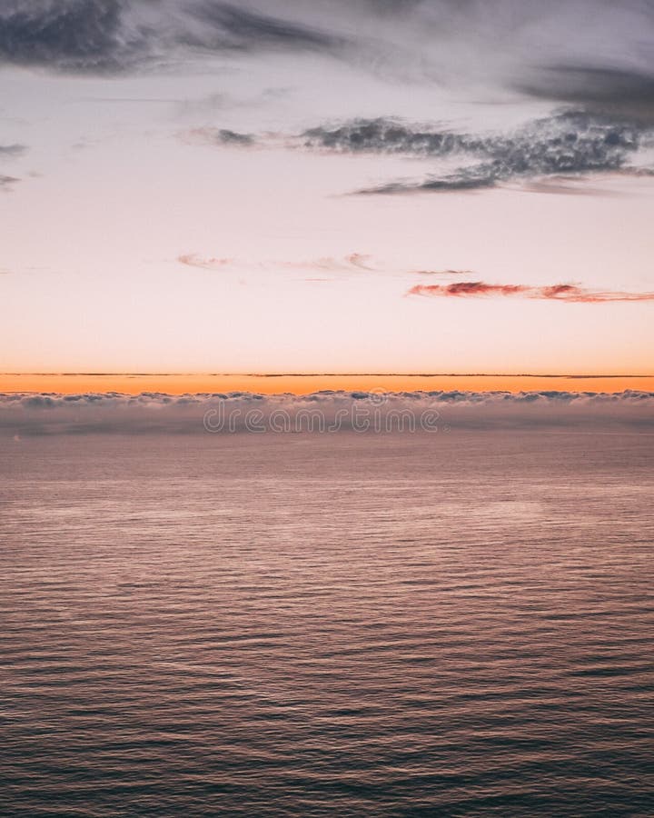 Vertical Image of a Beautiful Ocean View with Waves and an Orange ...