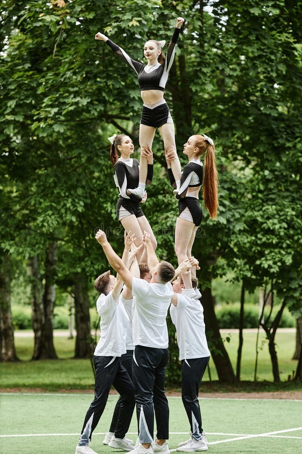 Cheerleader Team Performing Together Outdoors Stock Photo - Image of ...