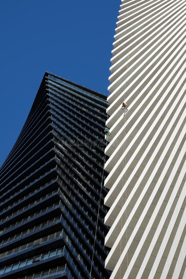 Vertical Image a Cleaning Company Performs Work on a Skyscraper Stock ...