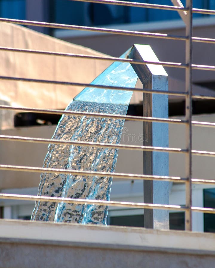 Vertical Image of a Delightful Mini Fountain Located in an Urban ...