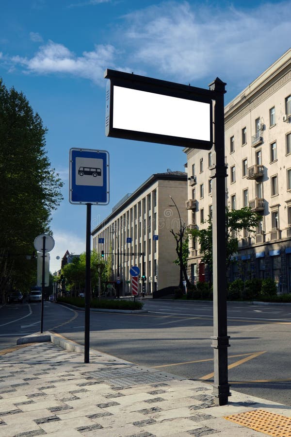 Vertical Image of an Empty Information Sign at a Bus Stop Against the ...