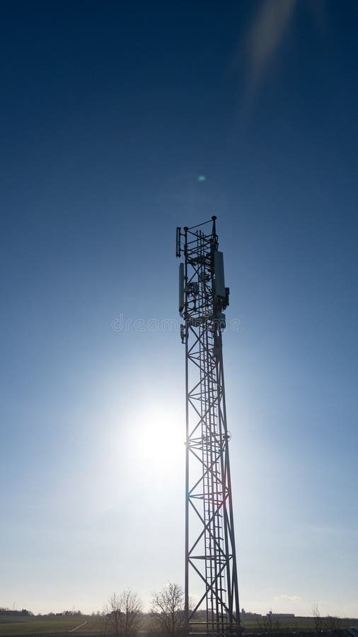 Solar Flare: Telecommunication Tower Against the Sun Stock Image ...