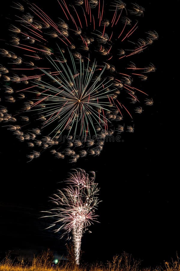 Vertical Image of a Fireworks Display with Wind Affecting the ...