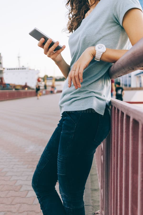 Vertical Image of a Girl Using a Mobile Phone Stock Photo - Image of ...