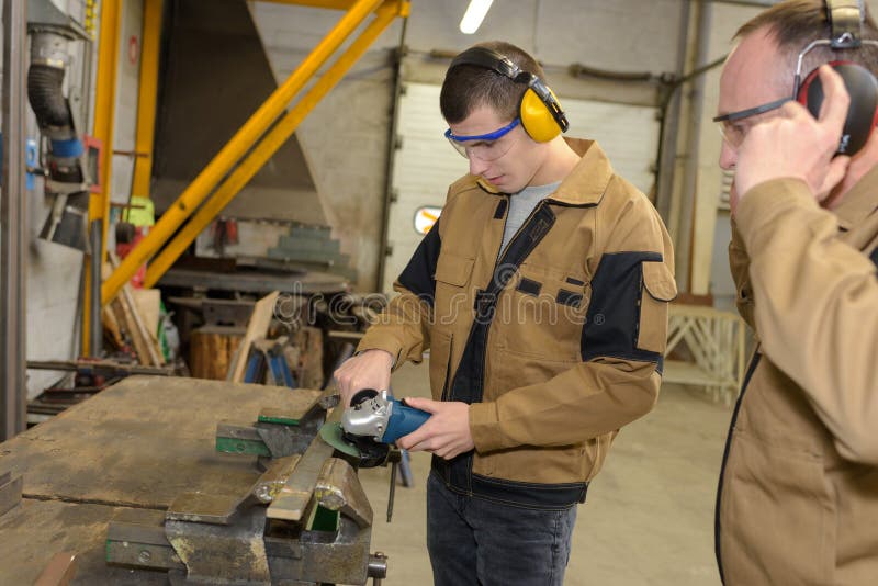 Vertical Image Man Working in Joinery Polishing Up Wood Stock Image ...