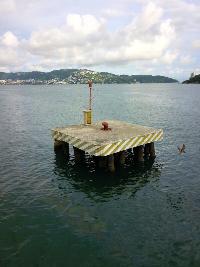 Vertical Image of a Marine Platform in the Middle of Acapulco Bay Stock ...
