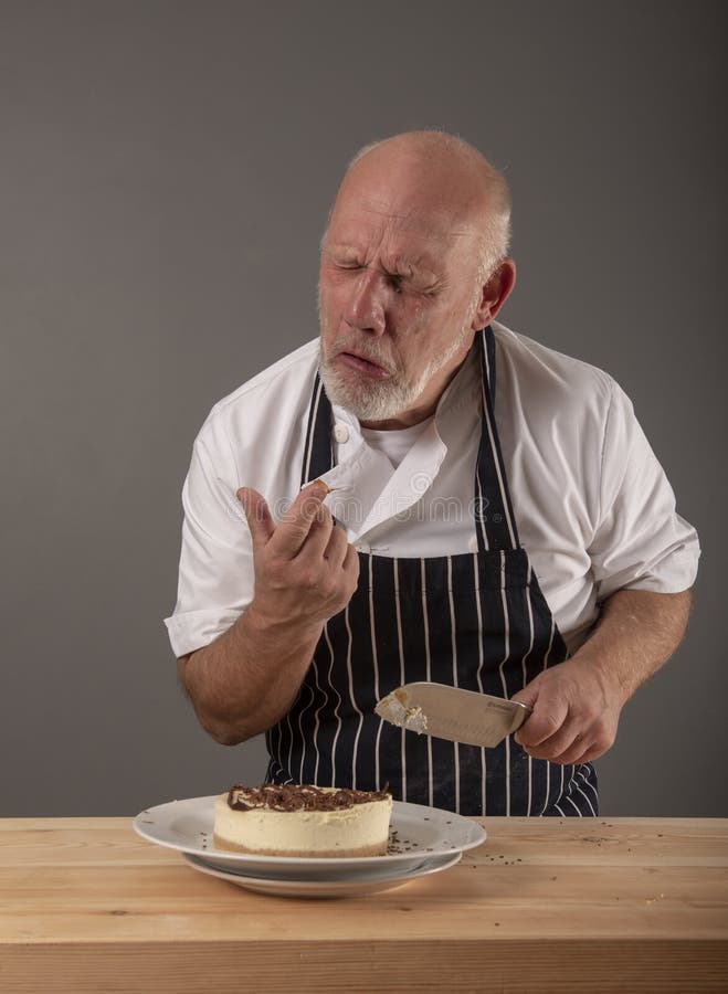 Mature Chef Making a Face after Tasting a Cake Stock Image - Image of ...