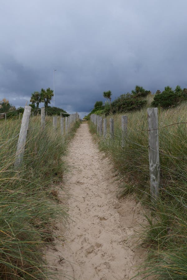 Vertical Image of Sandy Path with Simple Wire Fence Either Side Stock ...