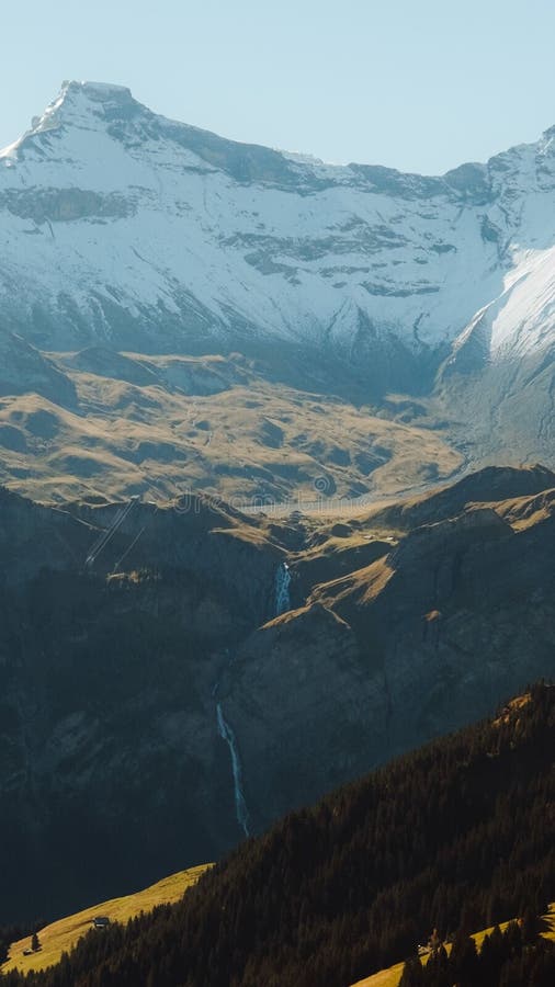 Vertical Image of Snow-covered Mountain Peaks in the Far Distance, a ...