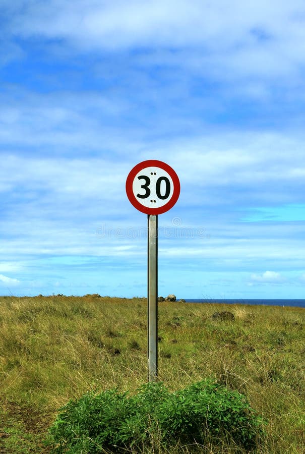Vertical Image of Speed Limit Signpost on the Roadside of Easter Island ...