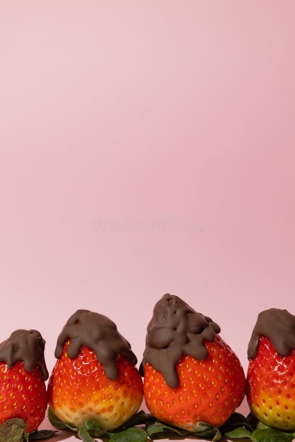 Vertical Image of Strawberries with Melted Chocolate Grouped Together ...
