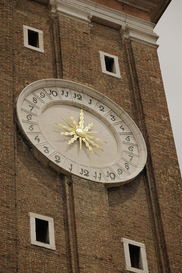 Vertical Image of the Sun Clock Tower Facade in Venice Stock Image ...