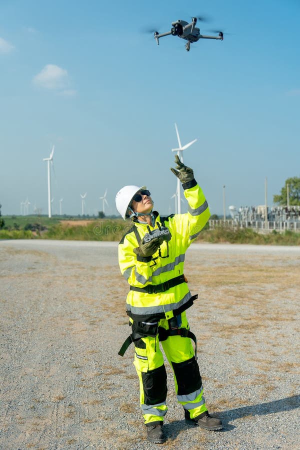 Vertical Image Wind Turbine or Windmill Worker Woman or Technician ...