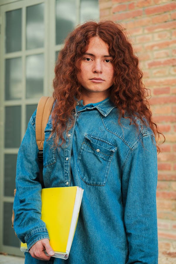 Vertical Individual Portrait of a Serious Student Standing and Looking ...