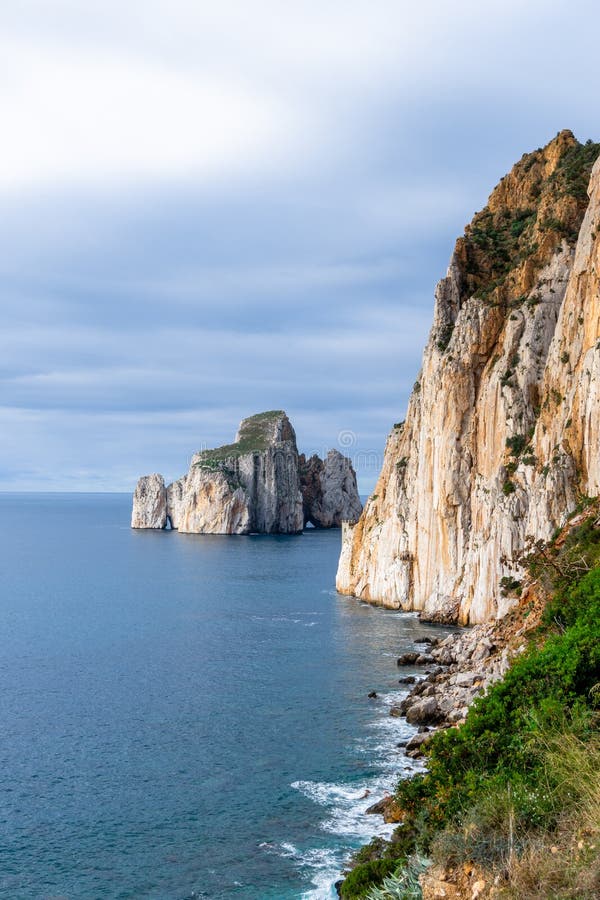 Vertical Landscape of the Cliffs and Sea Stacks at Porto Flavia on ...