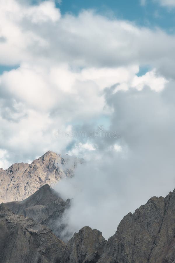 Vertical Cloud Landscape in the Mountains Stock Photo - Image of ...