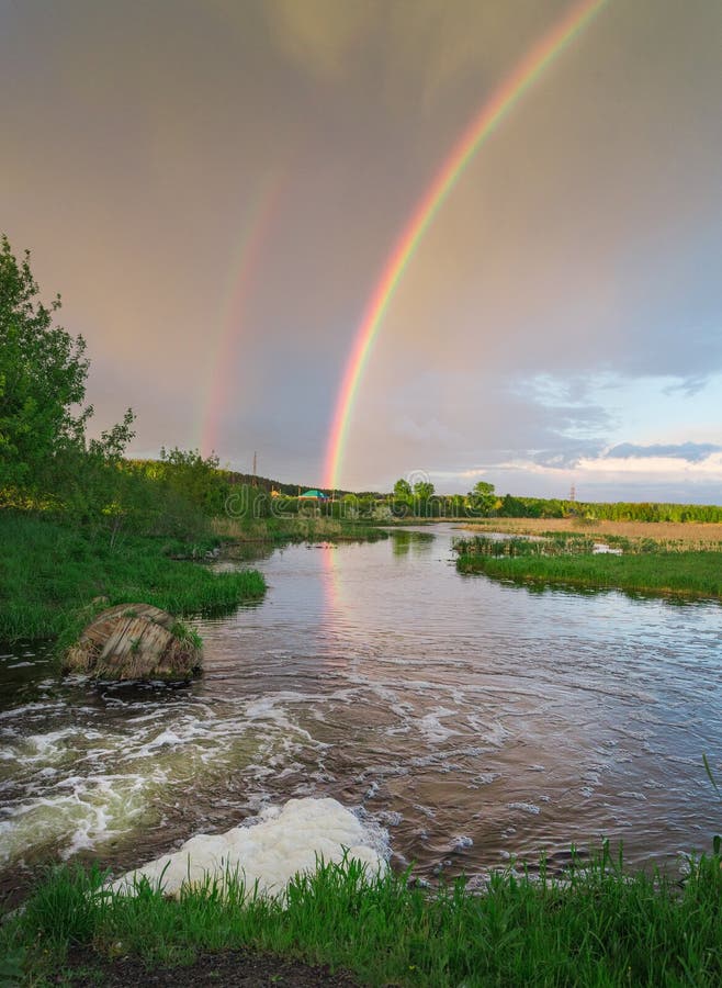 Vertical Landscape. Rainbow with Reflection in the River. Double ...