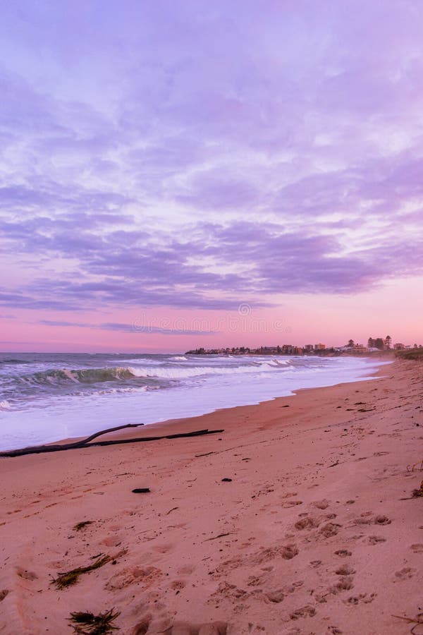 Vertical Landscape Shot of a Beautiful Colorful Sunset at the Beach ...