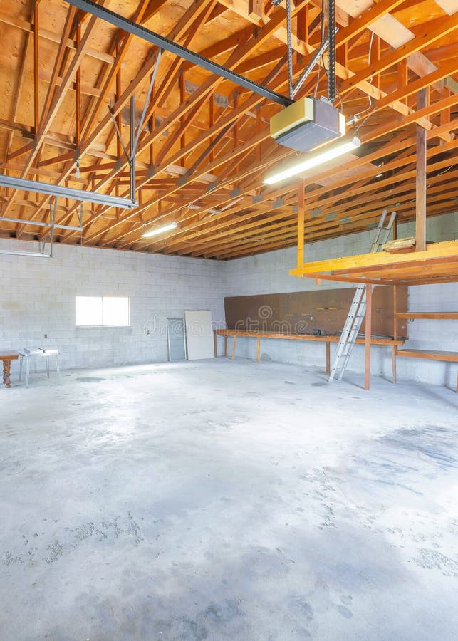 Vertical Large Garage Interior with Automatic Door Operator Machine ...