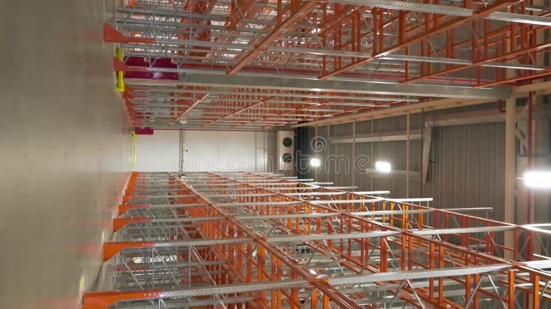 Vertical of Large Storage Premise with Aisle between Empty Racks Stock ...