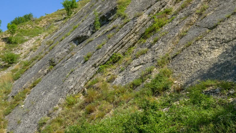 Vertical Layers of Sedimentary Rocks Stock Image - Image of blue ...