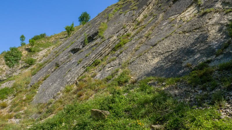 Vertical Layers of Sedimentary Rocks Stock Image - Image of blue ...