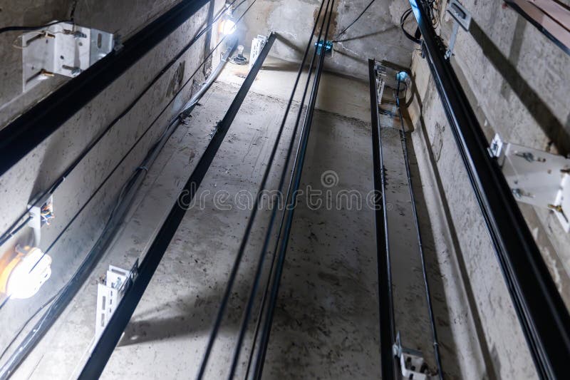 A Vertical Lift Shaft Equipped with Control Cables and Advanced ...