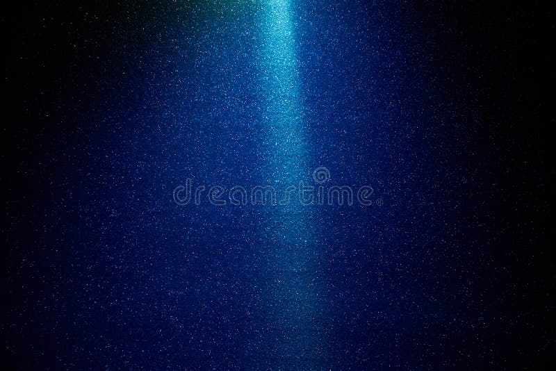 Vertical Light Blue Beam of Light on a Blue Grainy Background Stock ...