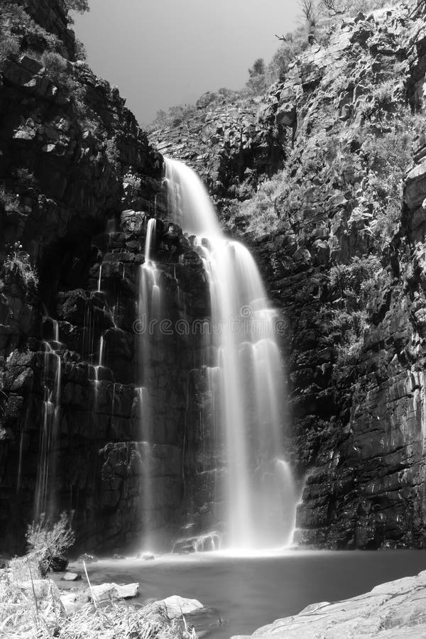 Vertical Light Exposure Grayscale Shot of a Waterfall Stock Photo ...