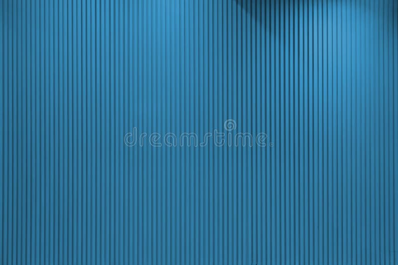 Vertical Line Textured Blue Wall with Lights Hitting it from Different ...