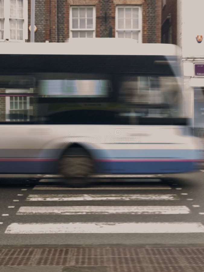 Vertical Long Exposure of a Bus Going Over a Crossing Stock Image ...