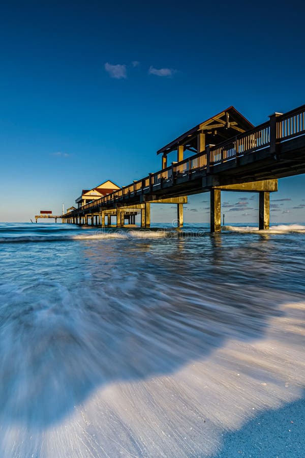 Vertical Long Exposure of a Pier at the Shore Stock Image - Image of ...