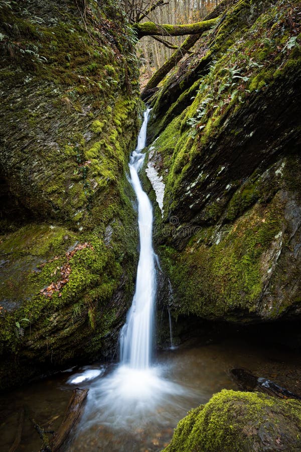 Vertical Long Exposure of the Water Falling Down a Mesmerizing Creek ...